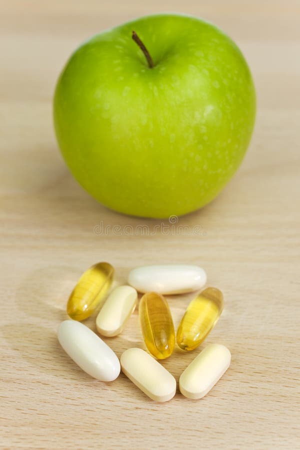 Green Apple Nutrition Supplement Pills or Medicine Stock Image - Image ...