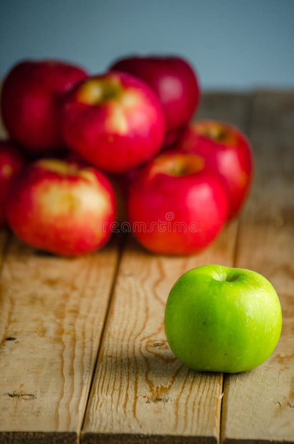 Green Apple Over Red Apples Stock Photo - Image of table, kitchen: 56012408