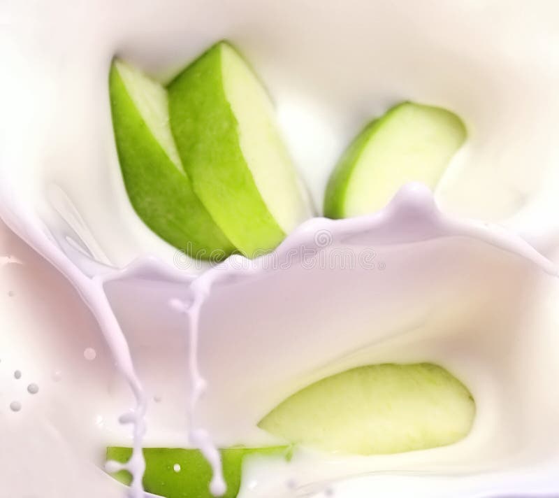 Green Apple Slices and Milk Stock Photo - Image of splash, food: 4604520