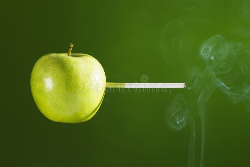Green apple and smoking stock image. Image of granny - 208798385