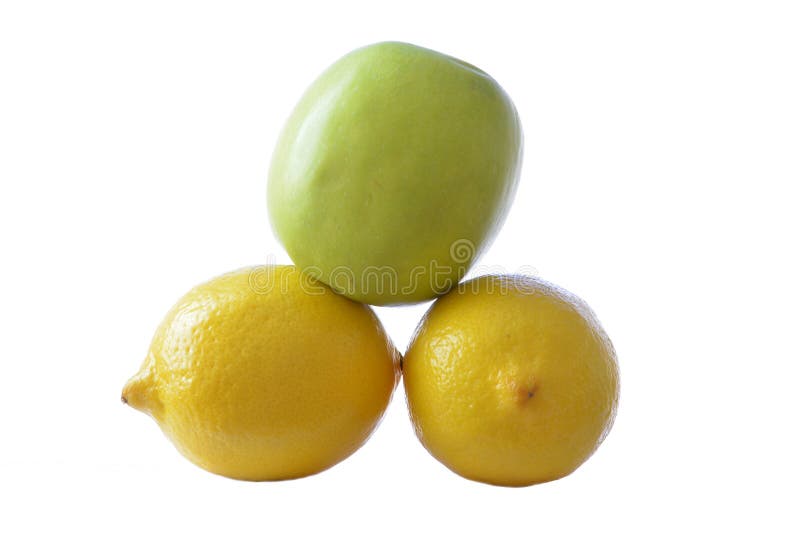 Green apple and two lemons stock image. Image of assortment - 39722079