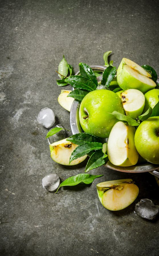 Green Apples in a Cup with Ice . Stock Image - Image of stone, rock ...