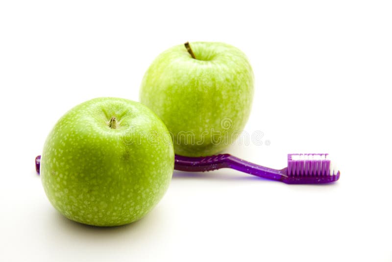 Green Apples with Toothbrush Stock Photo - Image of stem, bristles ...