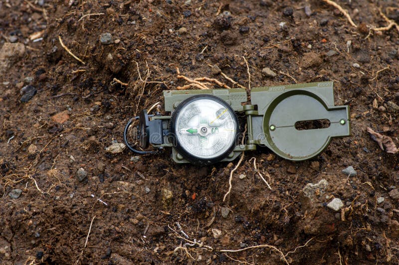 An Green Army Magnetic Compass on the Ground Stock Image - Image of ...