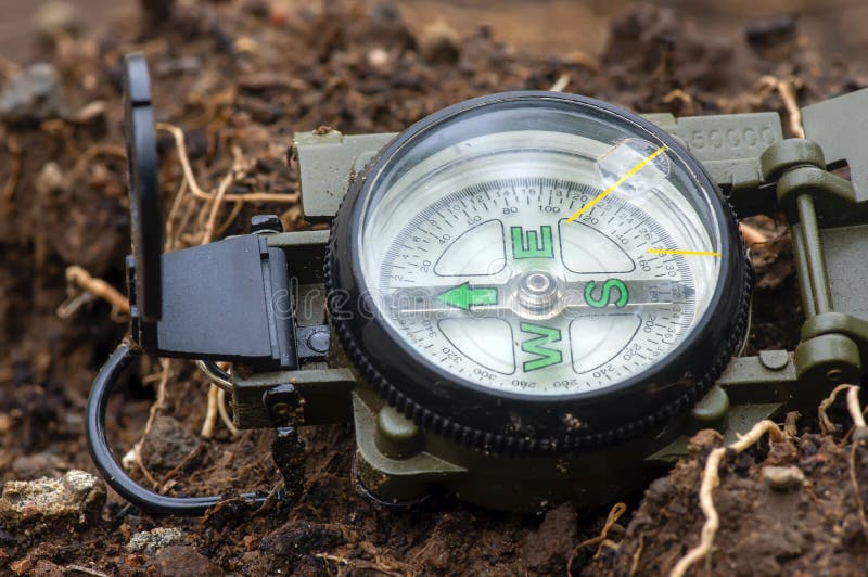 An Green Army Magnetic Compass on the Ground Stock Image - Image of ...