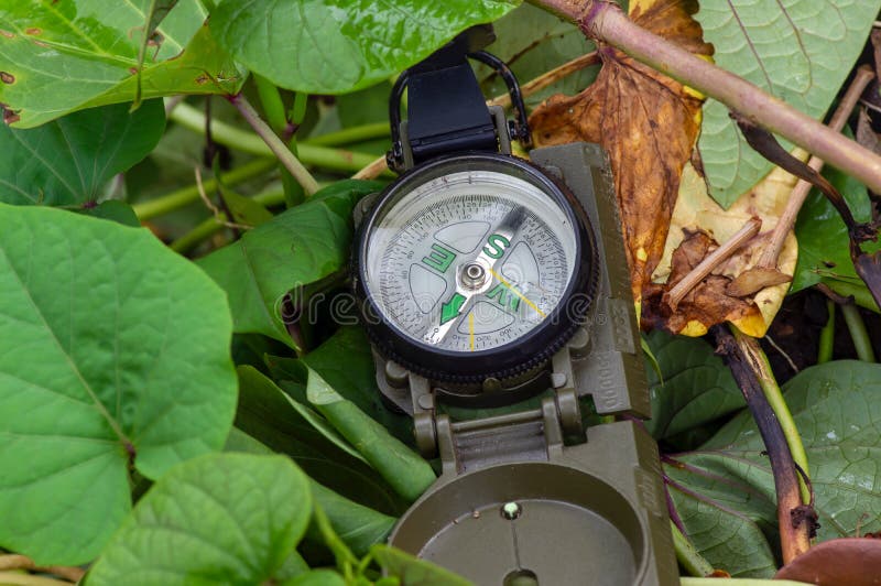 An Green Army Magnetic Compass on the Ground Stock Image - Image of ...