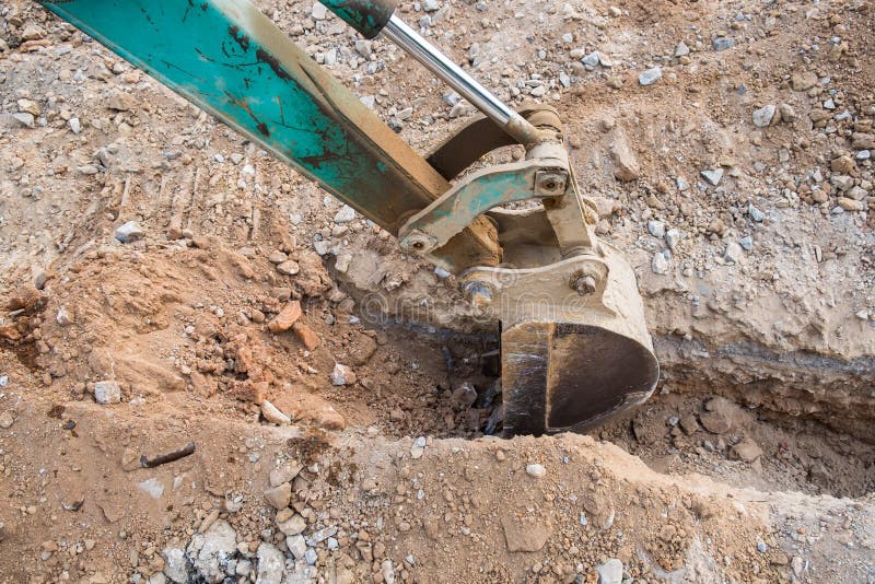 Green Backhoe Dredging Soil Stock Photo - Image of hydraulic, bulldozer ...
