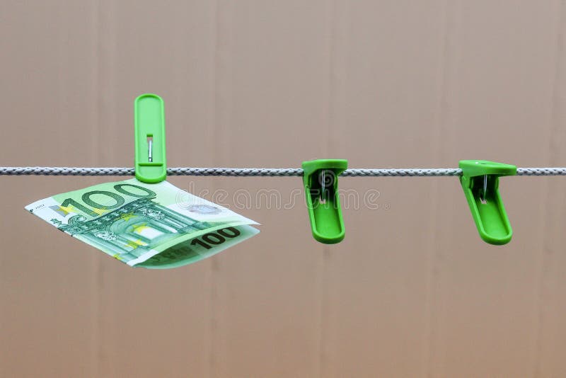 Green Banknote 100 Euro in Green Clothes Peg Stock Image - Image of ...