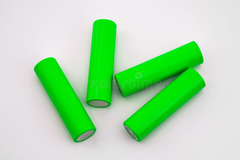 Green Batteries Isolated on White Background Stock Photo - Image of ...