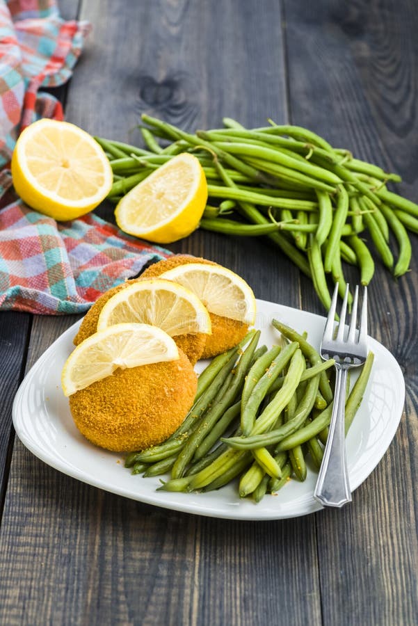 Green Bean and fish burger stock image. Image of breadcrumbs - 102111665