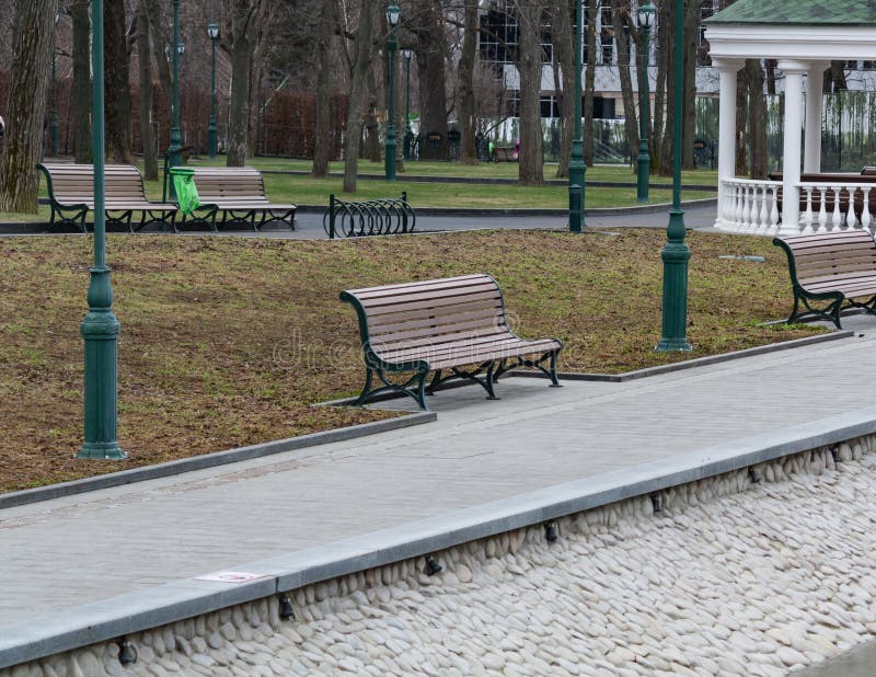 Green Benches in a City Park Stock Image - Image of city, landscape ...