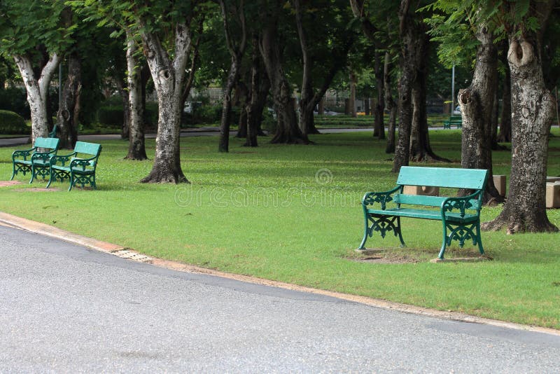 Green Benches beside Walkway. Stock Image - Image of grass, spring ...