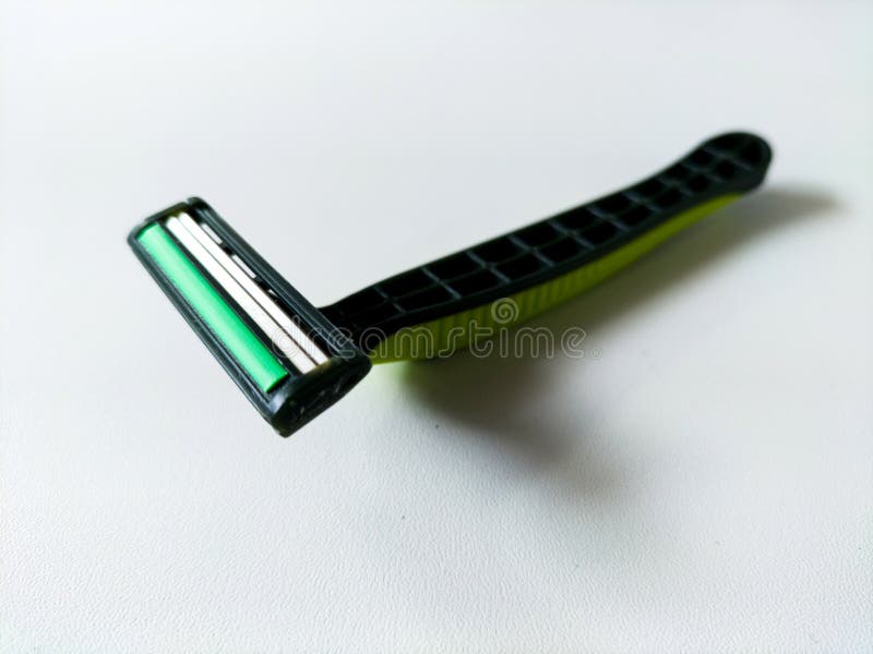 Green Disposable Razor on White Background Stock Image - Image of ...