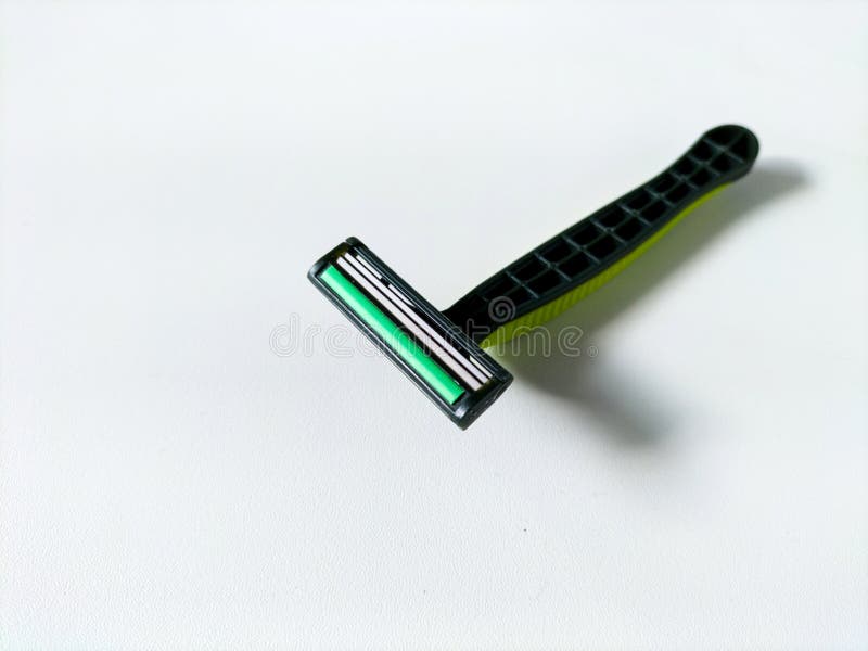 Green Disposable Razor on White Background Stock Photo - Image of ...