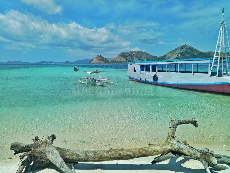 Green Blue Color of Sea and Boat Leaning Stock Image - Image of ocean ...