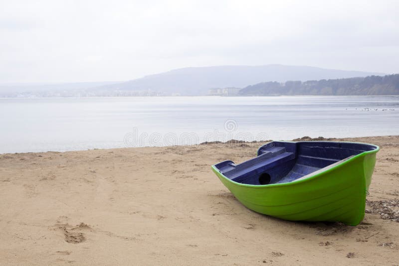 An Old Green Boat in a Frozen Lake. Boat Covered with Pure Snow Stock ...