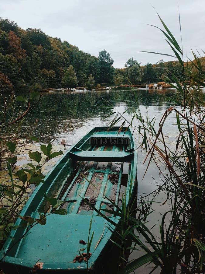 Green boat in a river stock image. Image of river, nature - 152847213