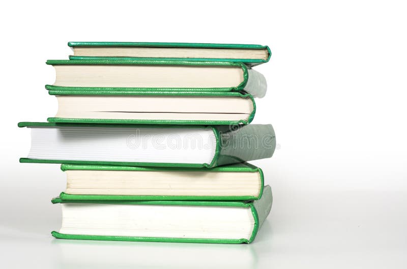 Green books stacked up stock photo. Image of isolated - 42789576