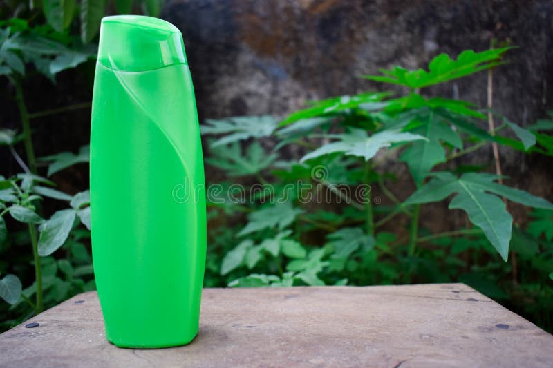 Green Bottle Shampoo for Mockup Product, Nature Background Stock Image ...