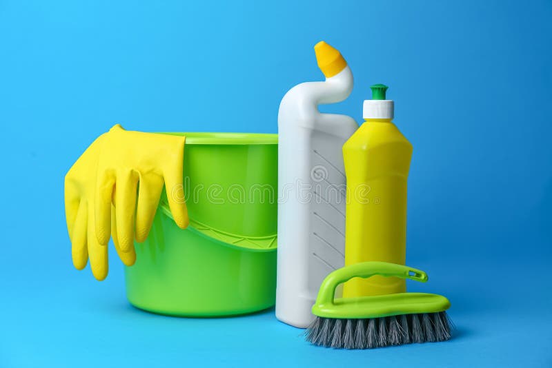 Green Bucket, Cleaning Supplies and Tools on Light Blue Background ...