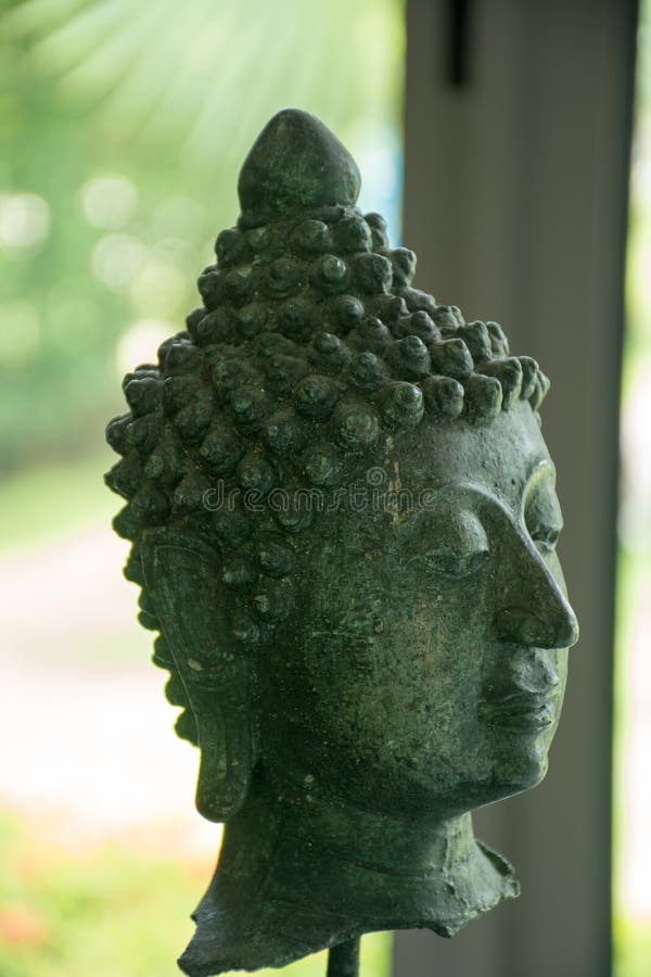 Green Buddha head stock photo. Image of religious, ancient - 58875810