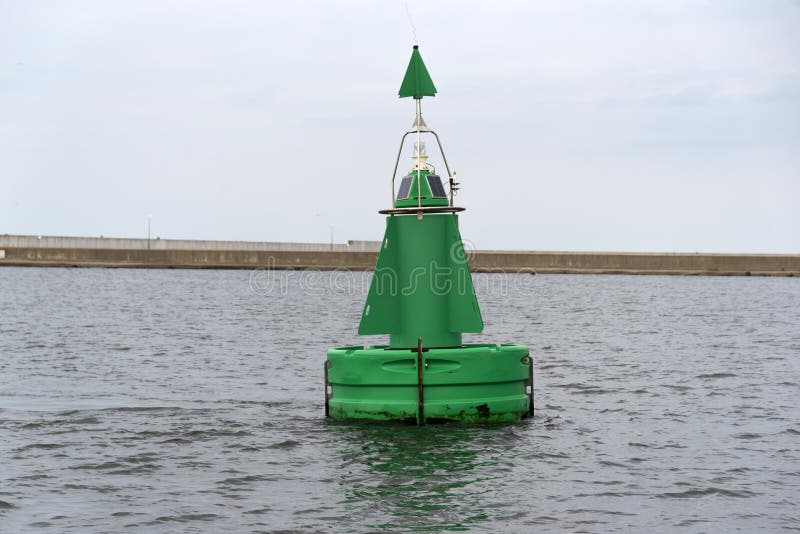 A Green Buoy on the River Marking the Fairway in the Reservoir Stock ...