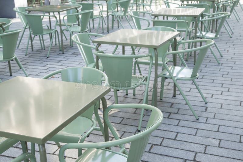 Green Cafe Tables and Chairs Stock Image - Image of drink, city: 68873601