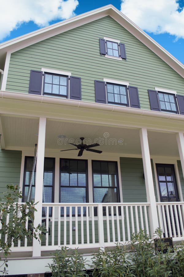 Green Cape Cod Style House stock photo. Image of architect - 23586600