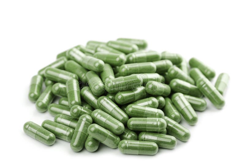 Green Capsule Pills with Red One Isolated Stock Photo - Image of care ...