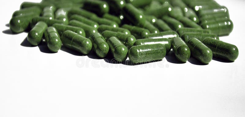 Green capsules stock image. Image of drugs, safe, vitamins - 13874127