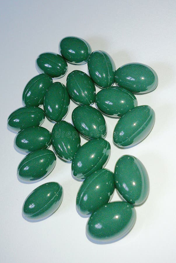 Green capsules stock photo. Image of vitamins, full, goodness - 44093086