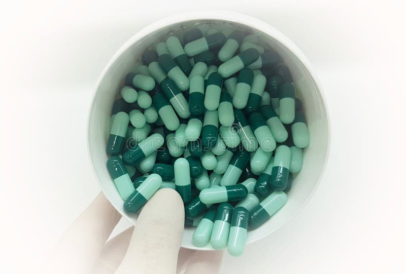 Green capsules stock image. Image of healthy, pharmacy - 154000121