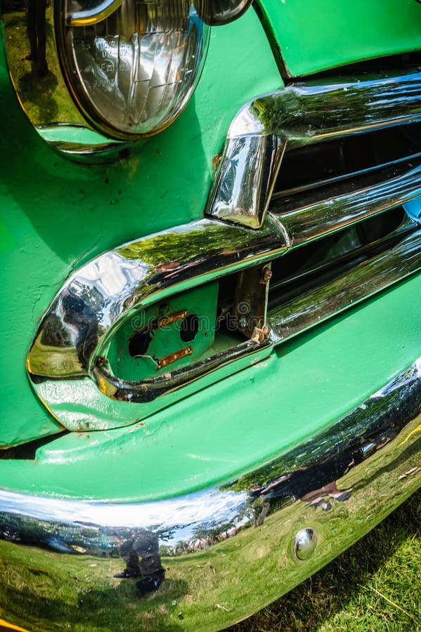 A Green Car with Chrome Trim and a Shiny Hood Editorial Photography ...