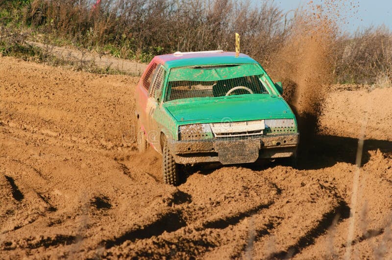 The Green Car Lifts Sandy Splashes Stock Image - Image of plough ...