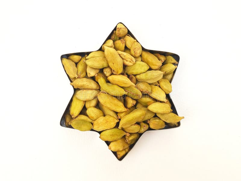 Green Cardamom Pods Defined Star Shaped on White Background, Top View ...