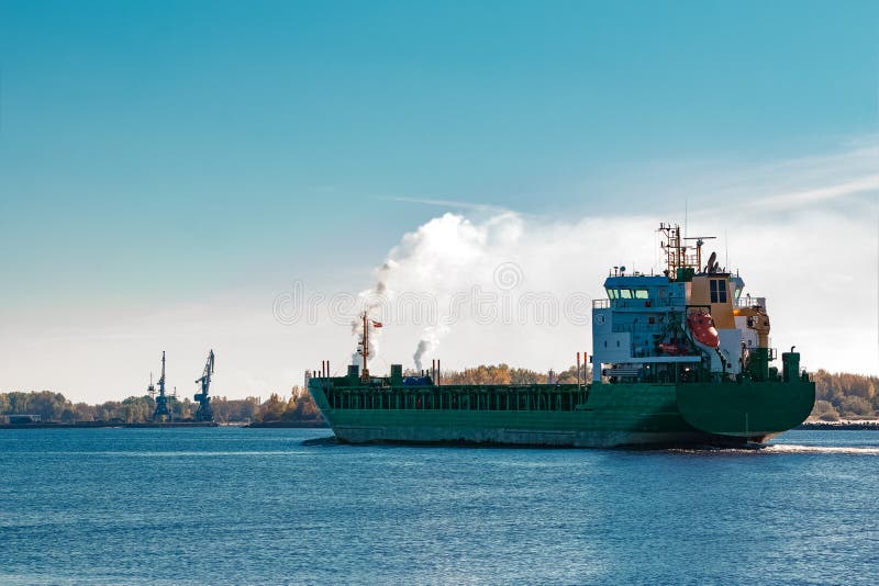 Green cargo ship stock image. Image of blue, latvia, bulk - 88241489