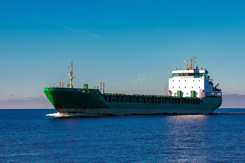 Green cargo ship stock photo. Image of sailing, export - 87829654