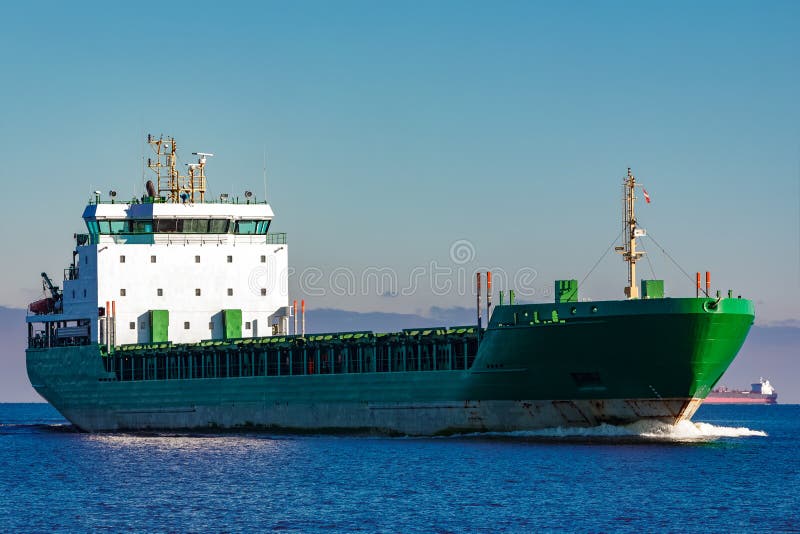 Green cargo ship stock image. Image of industry, ocean - 88473871