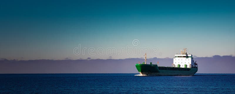 Green cargo ship stock image. Image of moving, nautical - 88608047