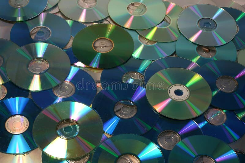 Green cd and dvd stock image. Image of technology, heap - 1277289