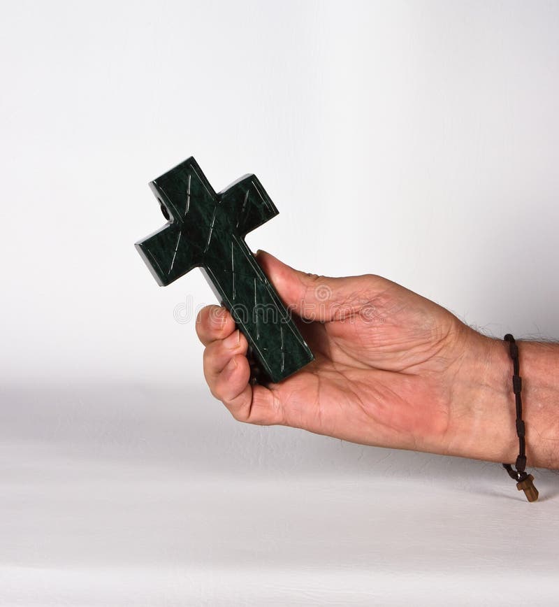 Green Ceramic Cross in Hand Stock Image - Image of religion, fingers ...