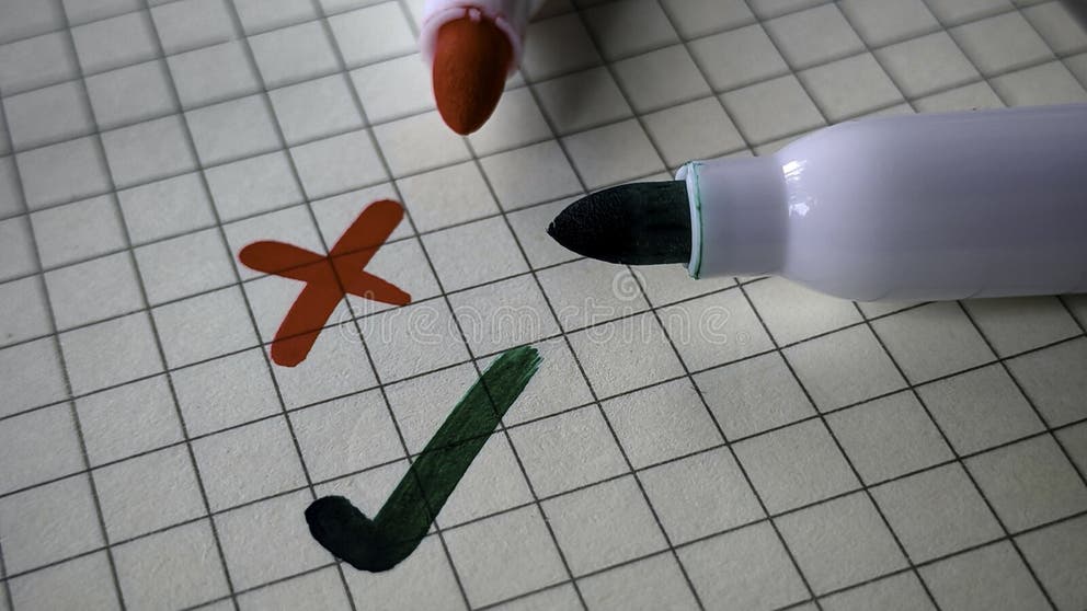 Green Check Mark and Red "X" on Graph Paper with Markers Stock Photo ...