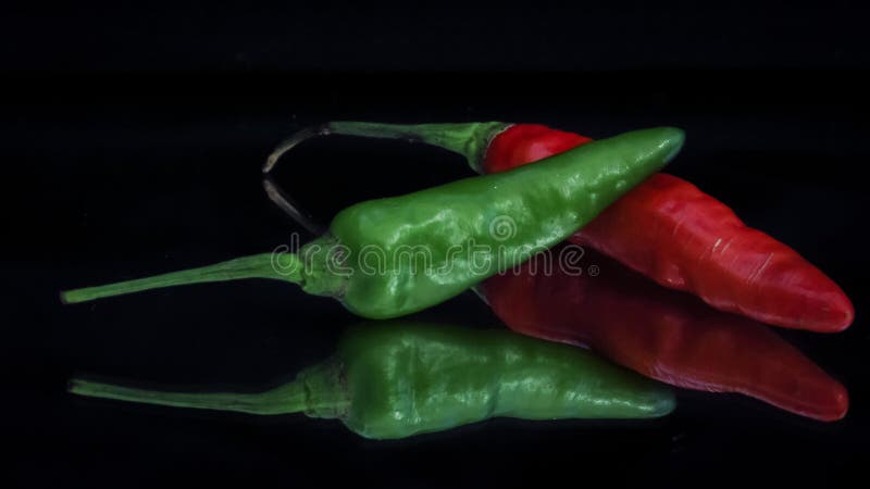 Green Chilli and Red Chilli Low Key Photography Stock Photo - Image of ...