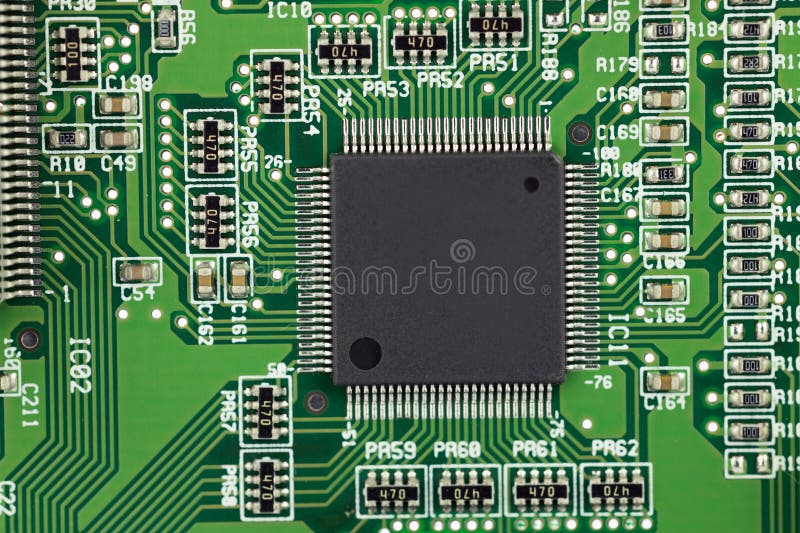 Green Circuit Board with Central Black Chip Stock Photo - Image of ...