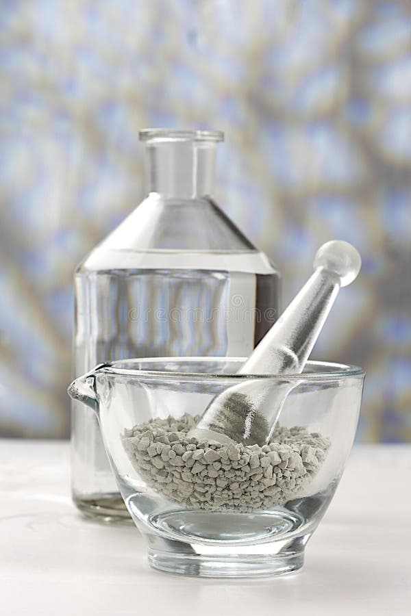 Green clay in glass mortar stock photo. Image of mineral - 37821408