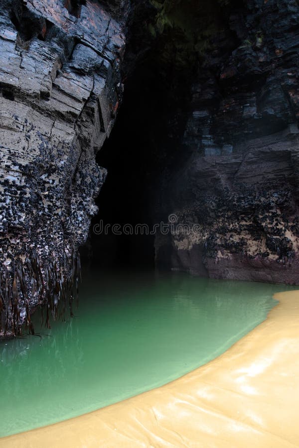 Green cliff pool stock photo. Image of cave, rock, pool - 14759354