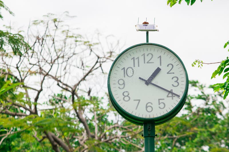 The Green Clock in the Park Stock Image - Image of beautiful, design ...