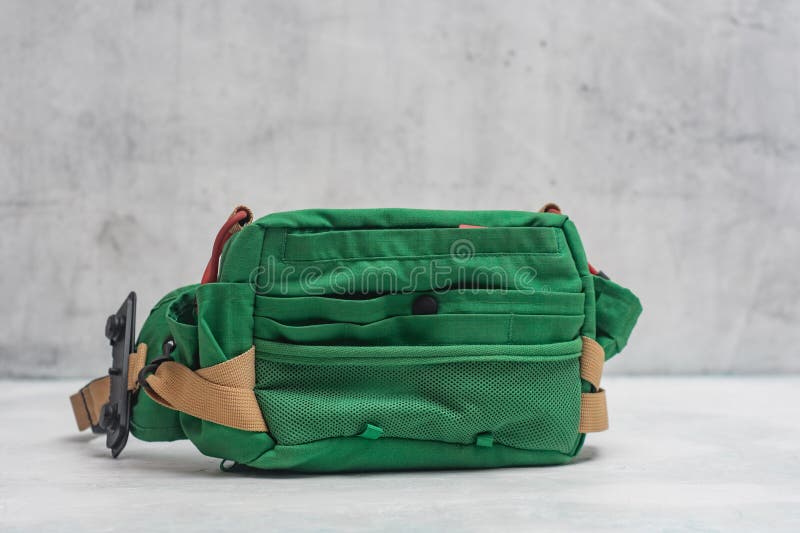 Green Cloth Belt Bag on the Table. Stock Image - Image of buckle ...