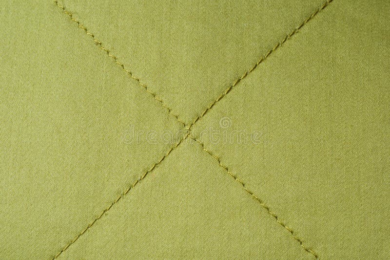 Green cloth with X seam stock photo. Image of mechanical - 38095016