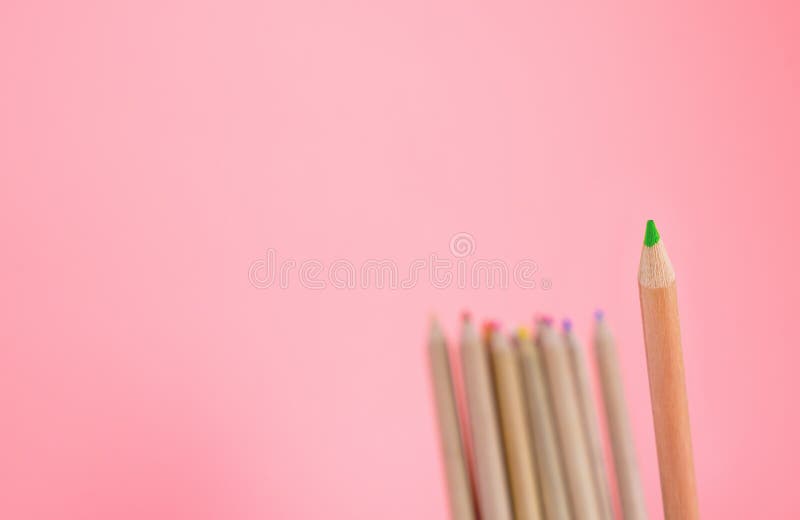 Green Color Pencil Stick Out on Pink Stock Photo - Image of stick, blue ...